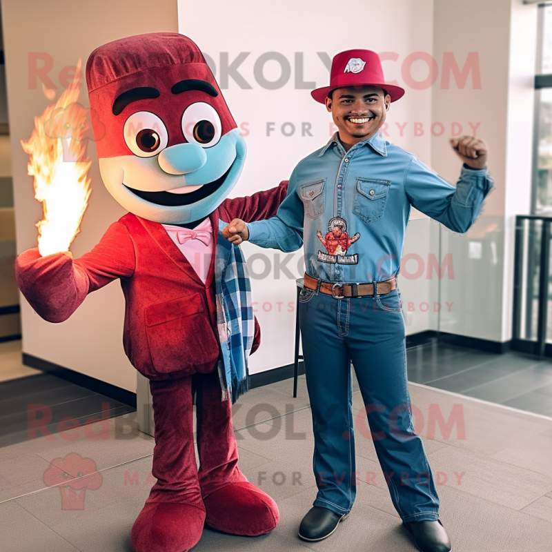 Maroon Fire Eater mascot costume character dressed with a Denim Shirt ...