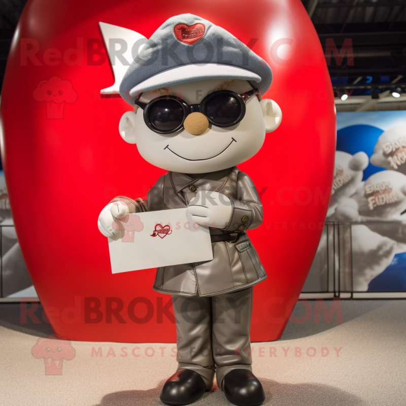 Silver Love Letter mascot costume character dressed with a Leather ...