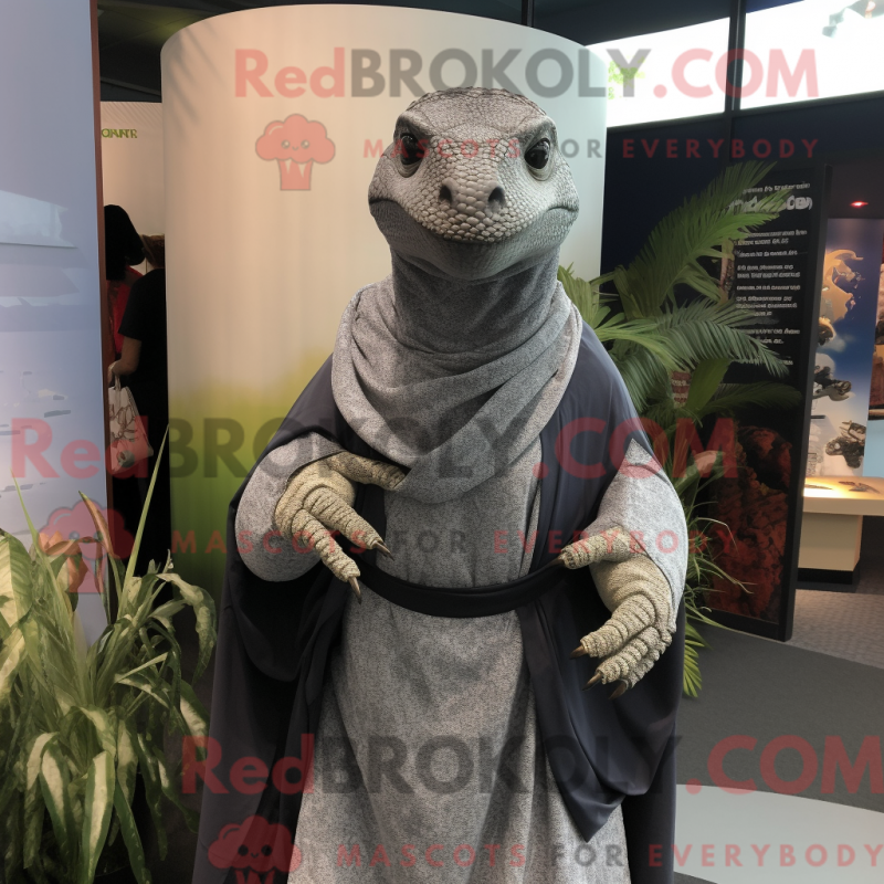 Gray Komodo Dragon mascot costume character dressed with a T-Shirt and ...