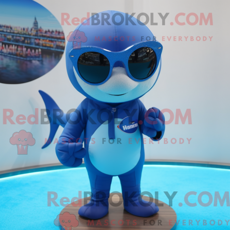 Blue Killer Whale mascot costume character dressed with a Swimwear and ...