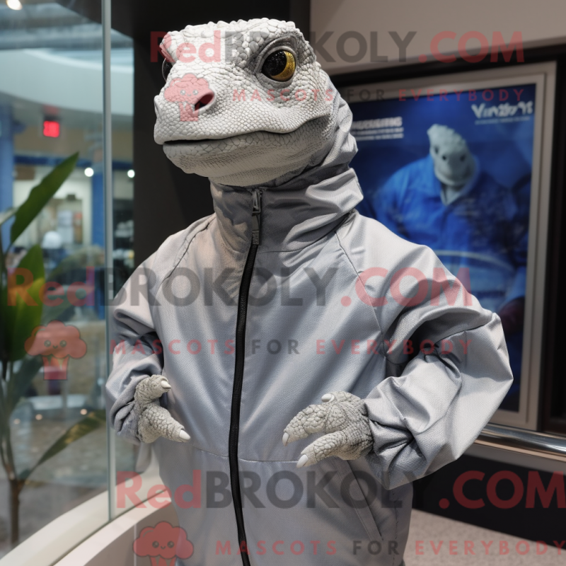Silver Komodo Dragon mascot costume character dressed with a ...