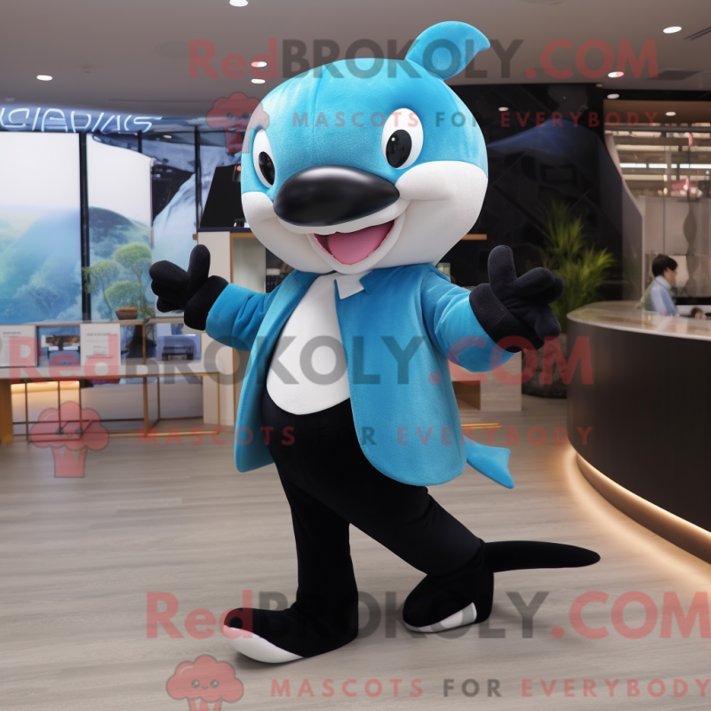Sky Blue Killer Whale mascot costume character dressed with a Cardigan ...