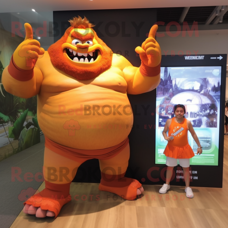 Personnage de costume de mascotte d'Ogre orange habillé d'un bikini et ...
