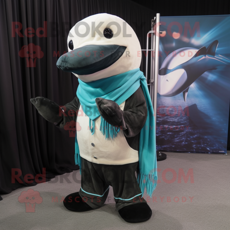 Teal Killer Whale mascot costume character dressed with a Corduroy ...