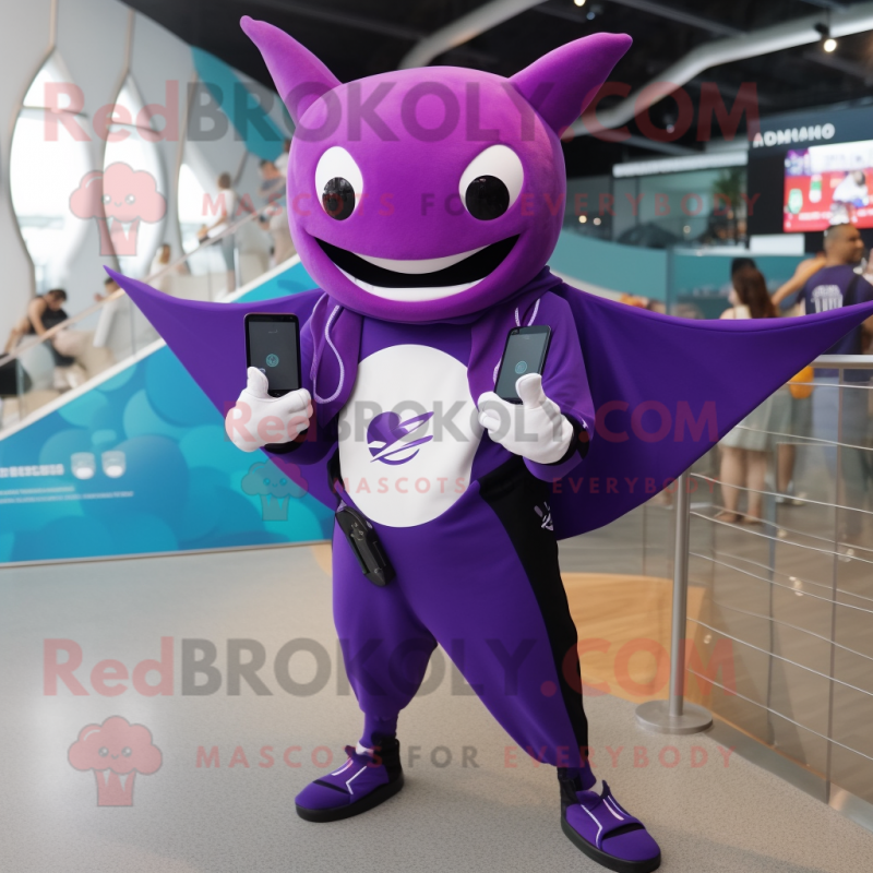 Purple Manta Ray mascot costume character dressed with a Graphic Tee ...