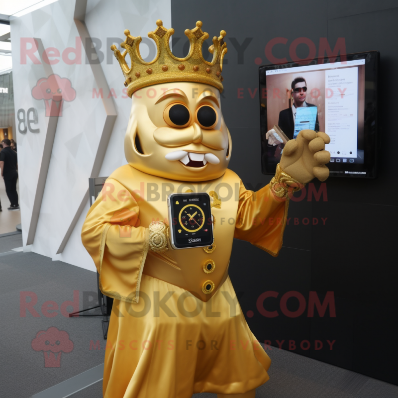 Gold King mascot costume character dressed with a Dress and Digital ...